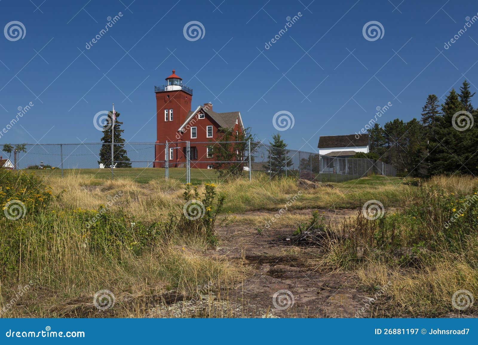 Two Harbors Lighthouse stock image. Image of coastline - 26881197