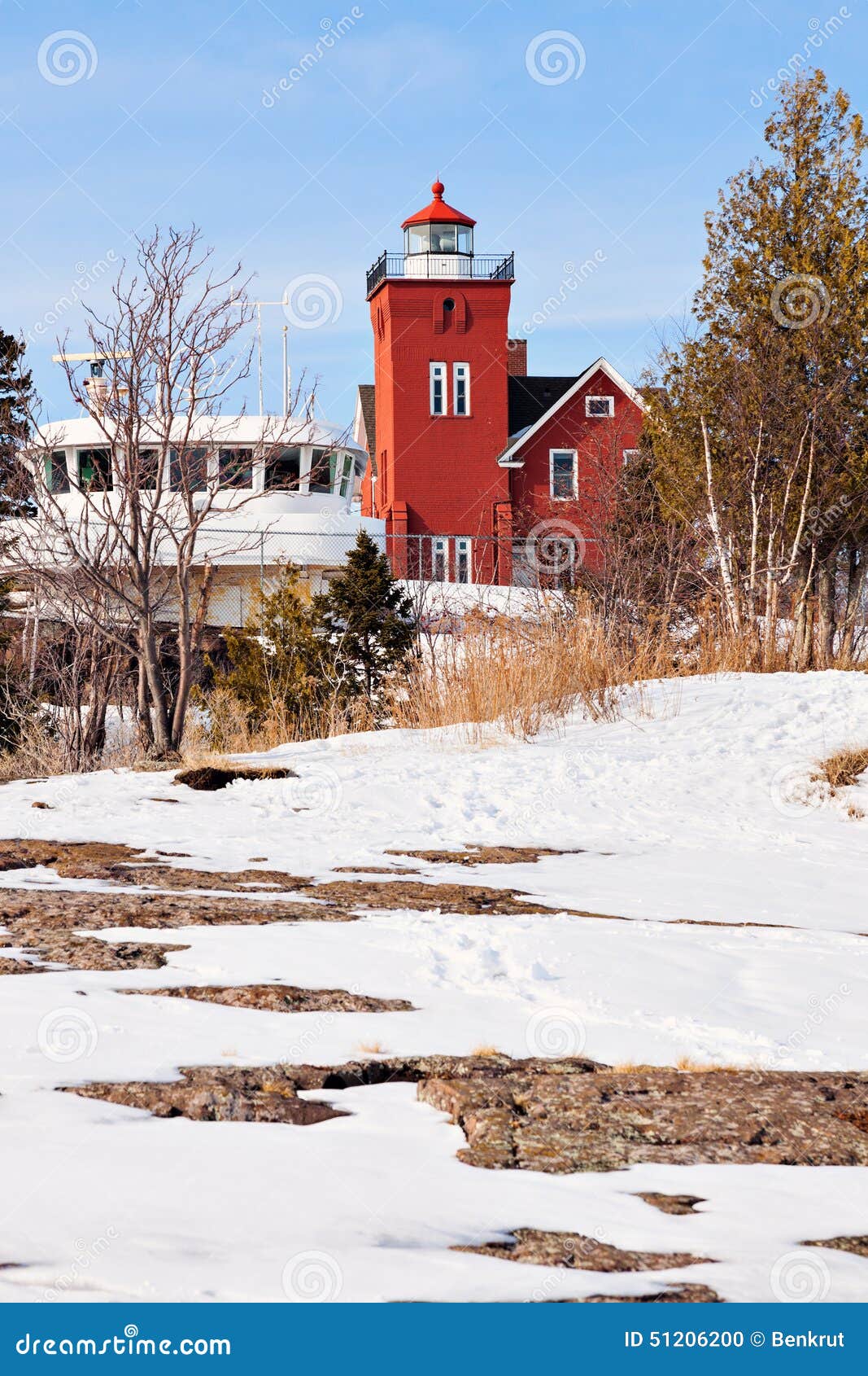 Two Harbors Lighthouse stock photo. Image of snow, lake - 51206200