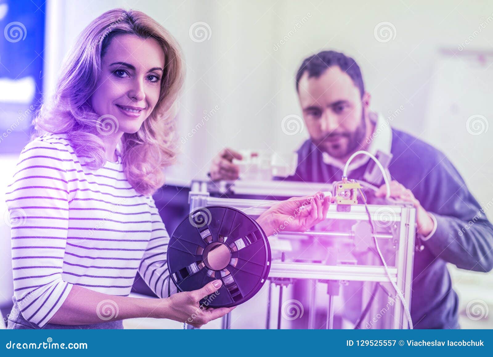 Two Hard-working Office Workers Feeling Curious while Standing Near New ...