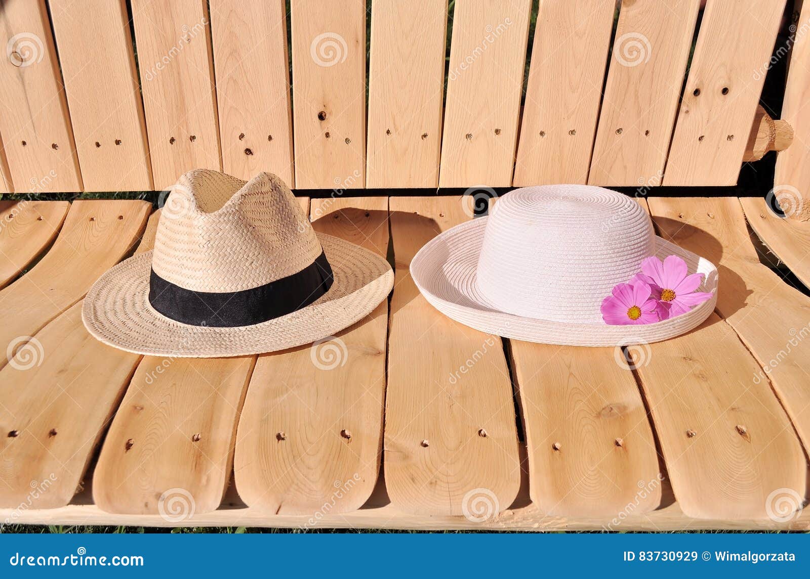 Two hats on a bench. stock image. Image of grandparents - 83730929