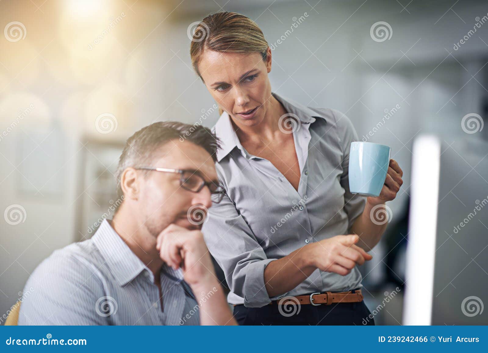 Two Heads are Better Than One. Cropped Shot of Two Colleagues Working ...