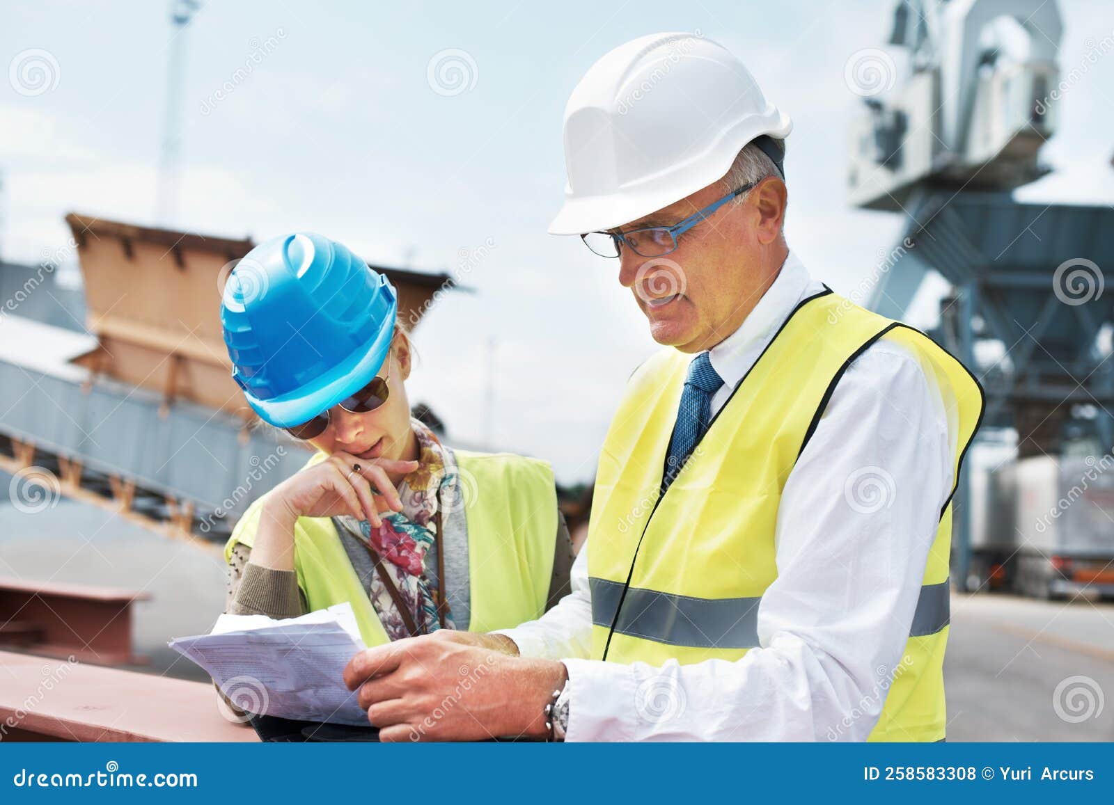 Two Heads are always Better Than One. Two Dock Workers Holding ...