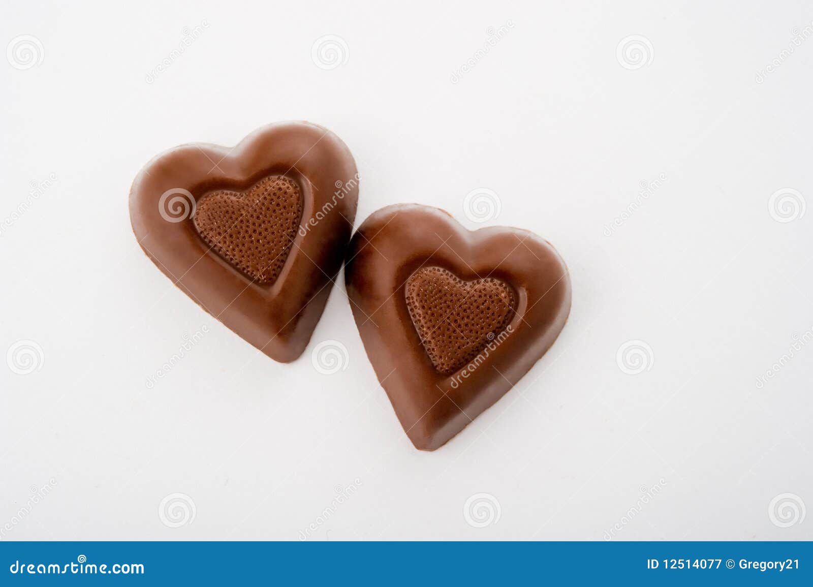 Two Heart Shaped Chocolates Stock Image - Image of piece, abstract ...