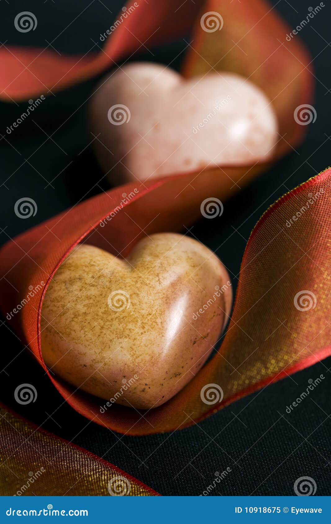 Two Hearts Intertwined with Red Ribbon Stock Image - Image of love ...