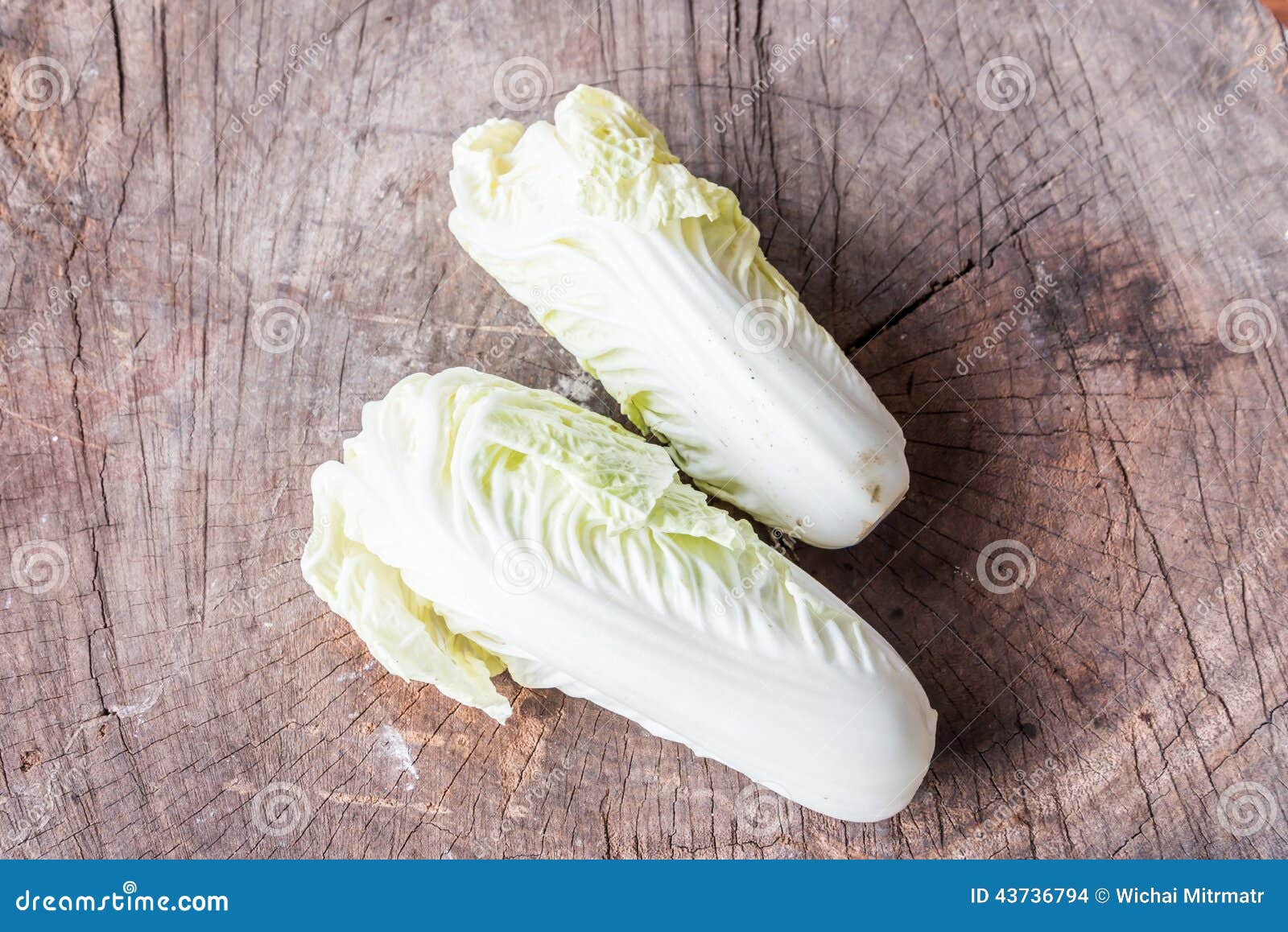 Two Hearts of Romaine Lettuce on a Rustic Wooden Board Stock Photo ...