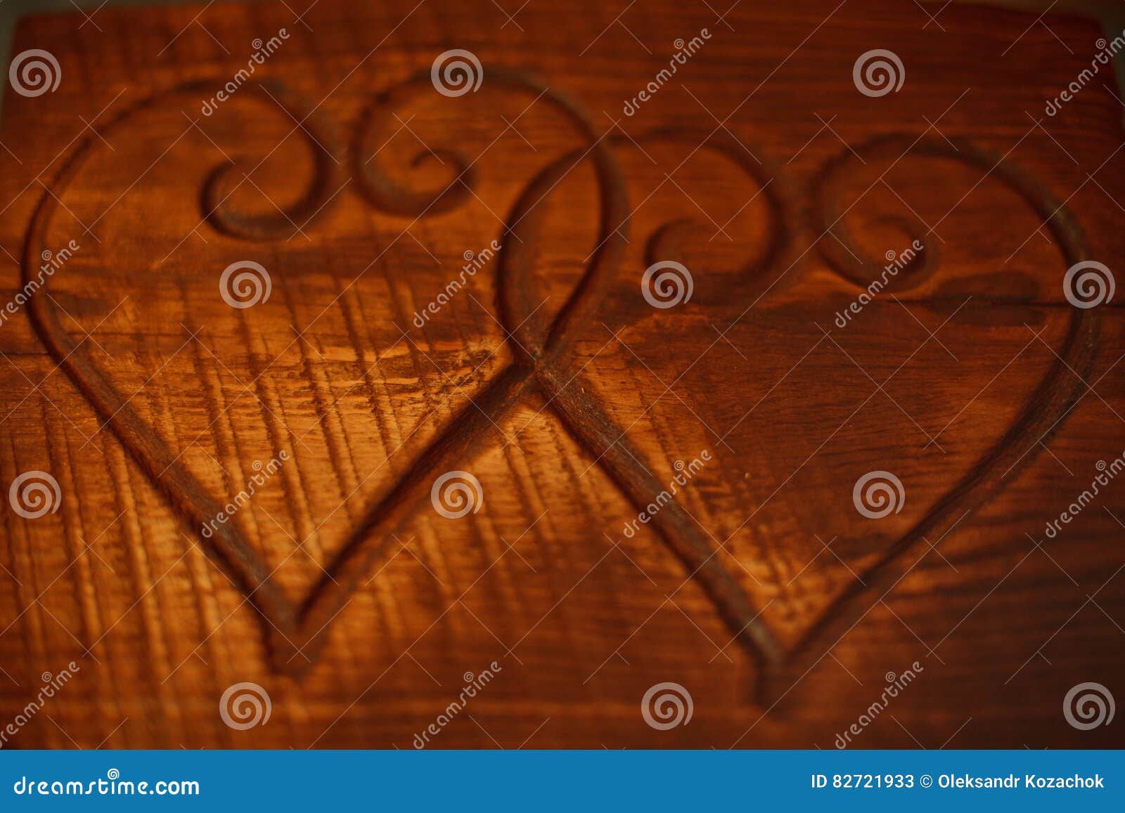 Two Hearts on a Wooden Table Stock Image - Image of metal, object: 82721933