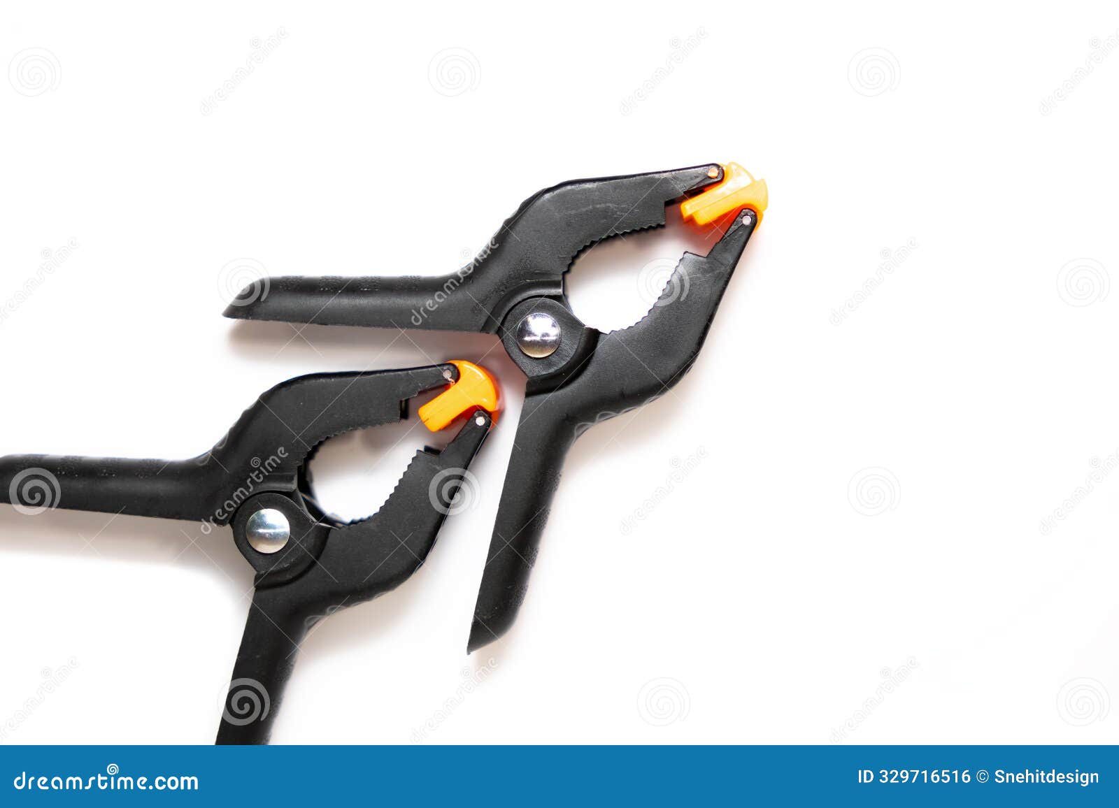 Two Heavy Duty Plastic Clamps on White Background Stock Photo - Image ...
