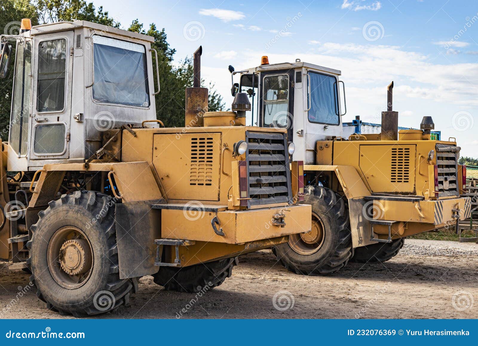 Two Heavy Wheel Loaders are Standing at a Construction Site. Equipment ...