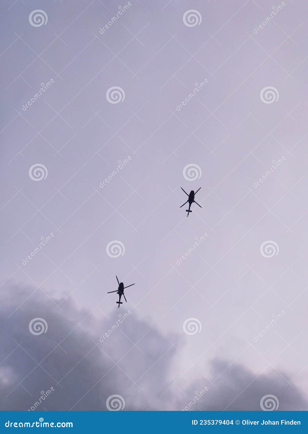 Two helicopters flying stock photo. Image of flying - 235379404