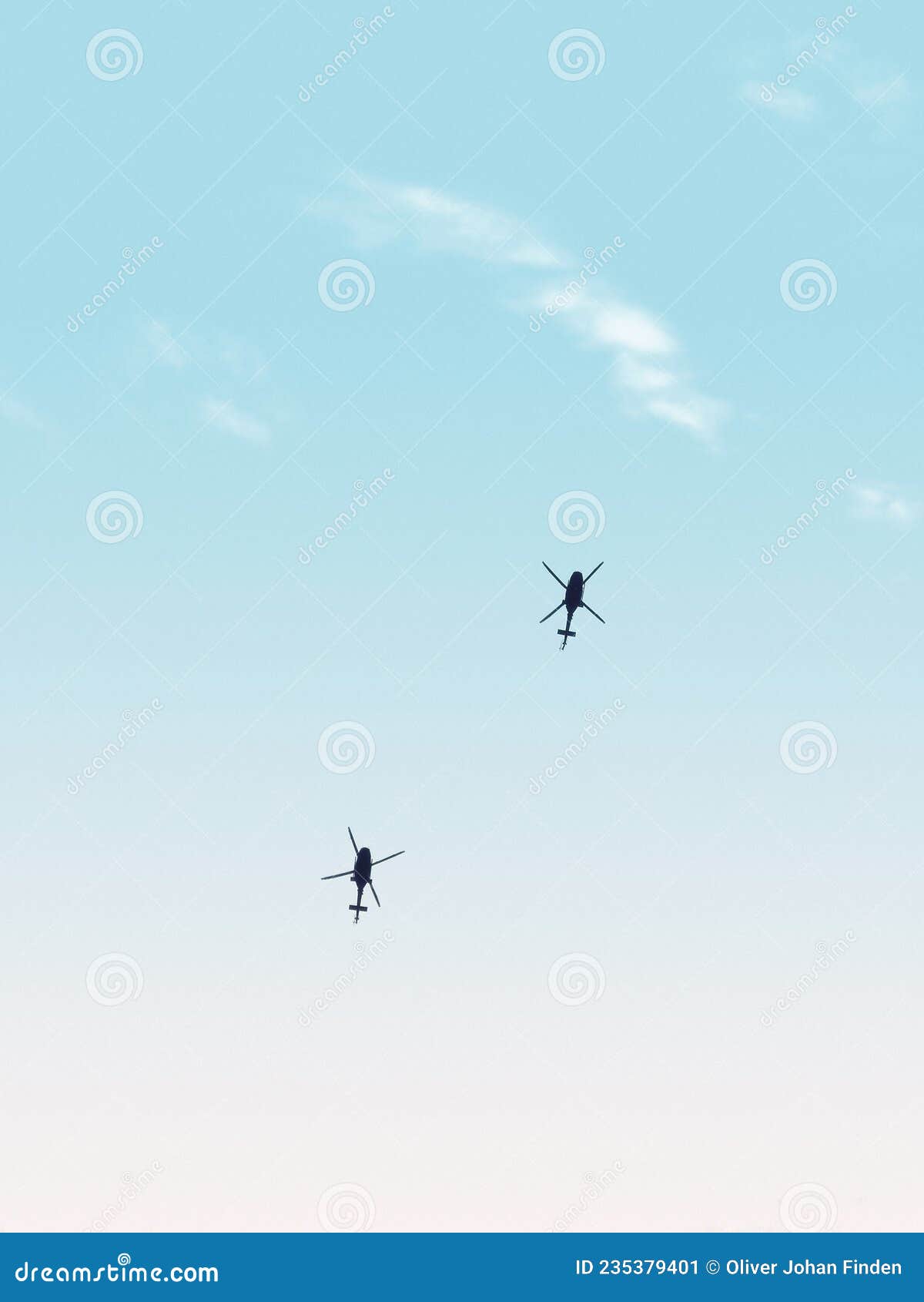 Two Helicopters Flying in a Clear Blue Sky Stock Image - Image of ...