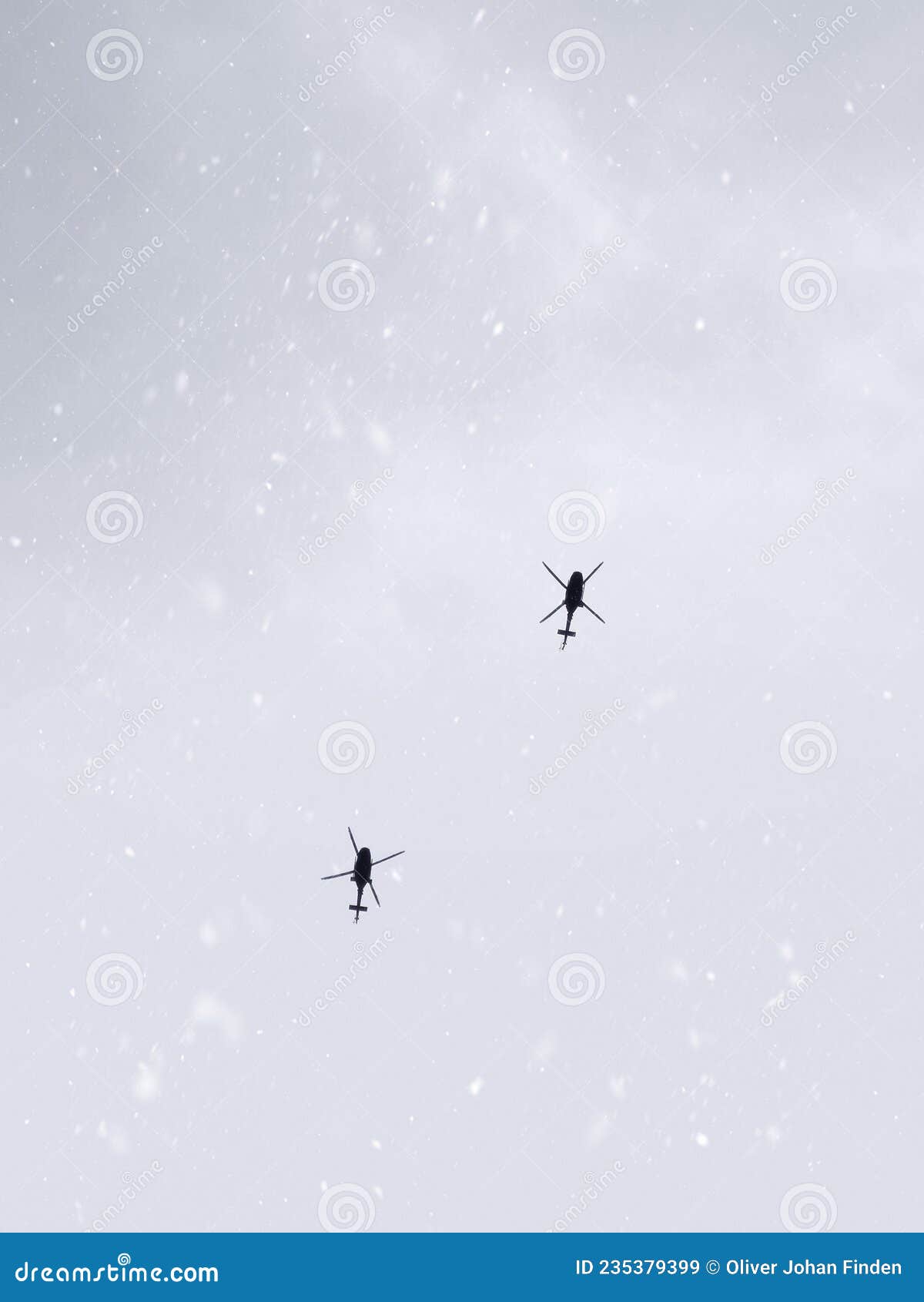Two Helicopters Flying through Snow Storm Stock Image - Image of ...