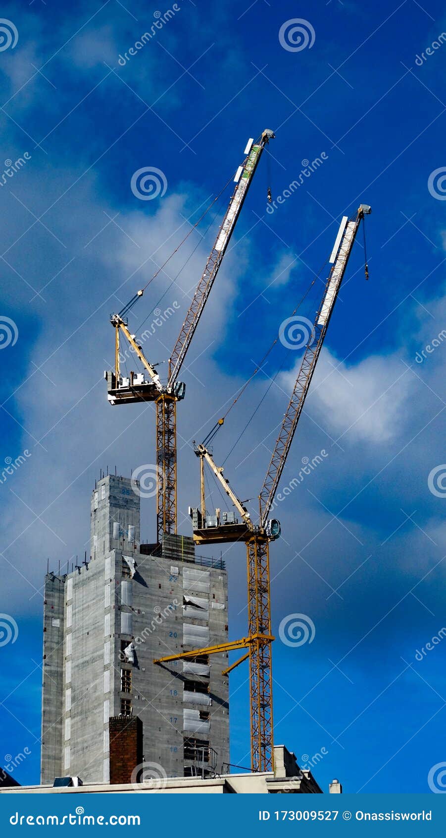 Two High Rise Cranes stock image. Image of building - 173009527