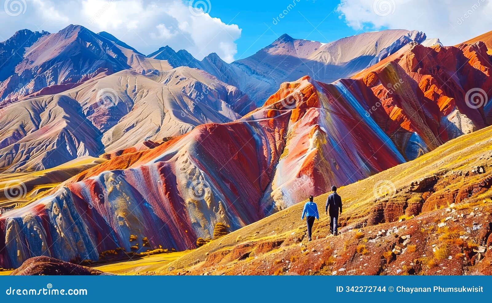Two Hikers Explore Vibrant Rainbow Mountain in Peru Under a Bright Blue ...