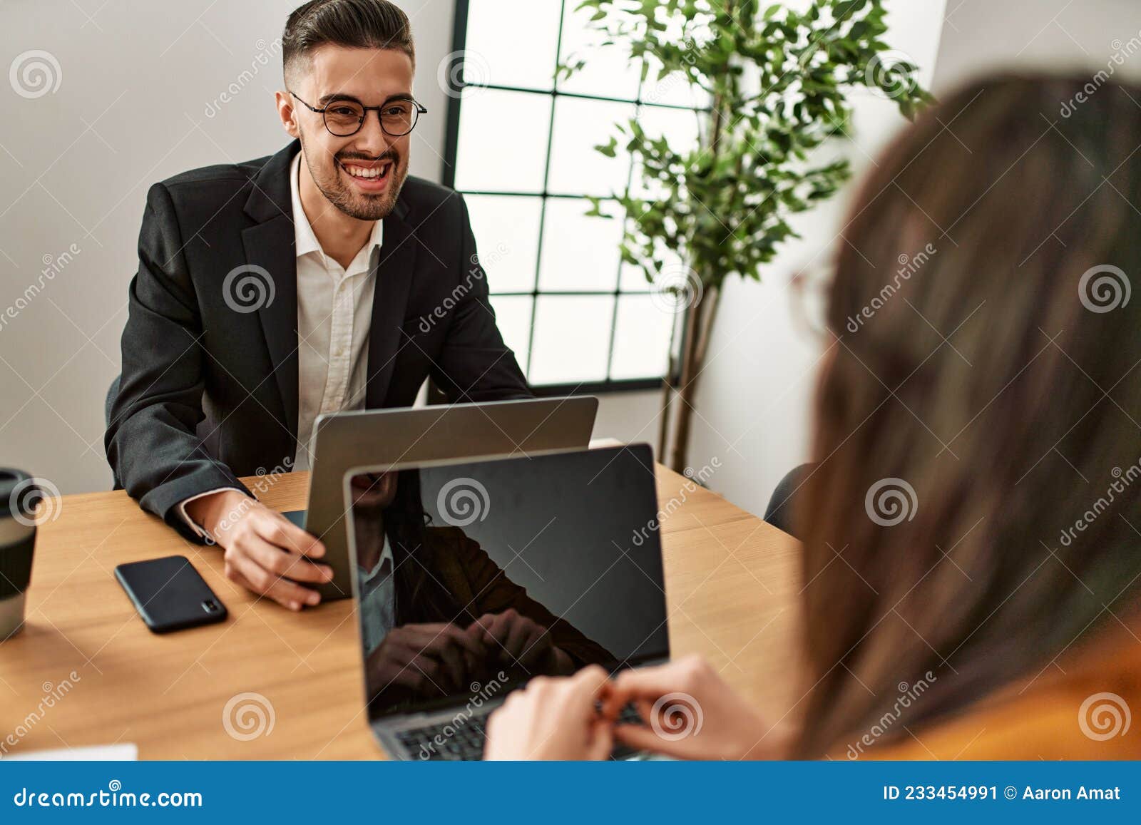 Two Hispanic Business Workers Smiling Happy Working at the Office Stock ...