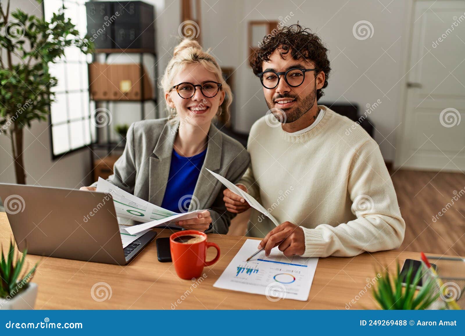 Two Hispanic Business Workers Smiling Happy Working at the Office Stock ...