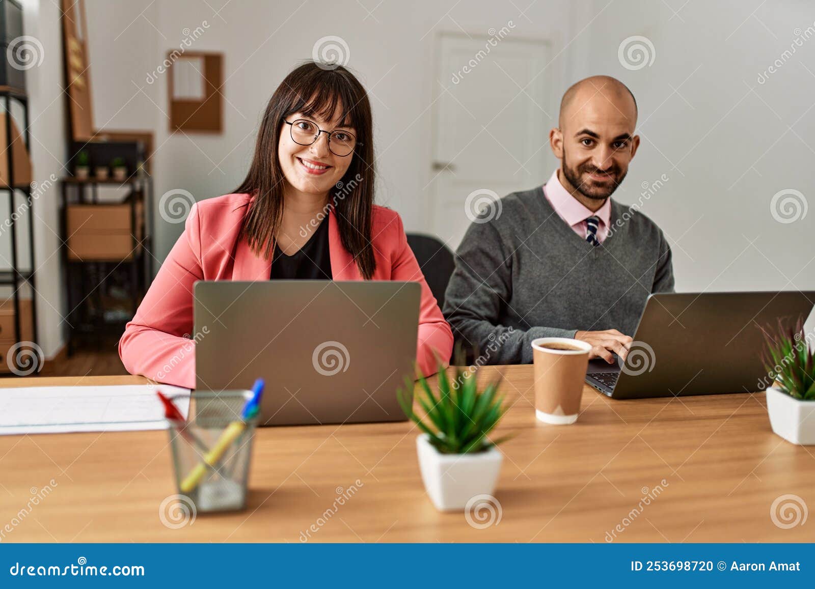 Two Hispanic Business Workers Smiling Happy Working at the Office Stock ...