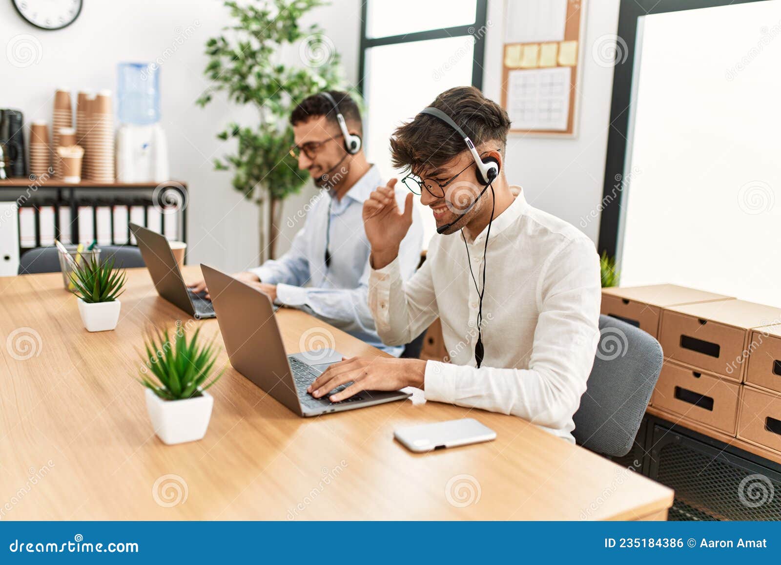 Two Hispanic Men Call Center Agents Smiling Confident Working at Office ...