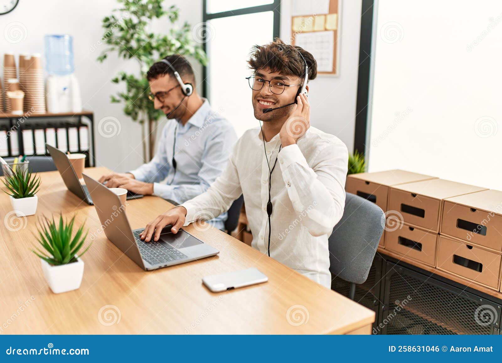 Two Hispanic Men Call Center Agents Smiling Confident Working at Office ...
