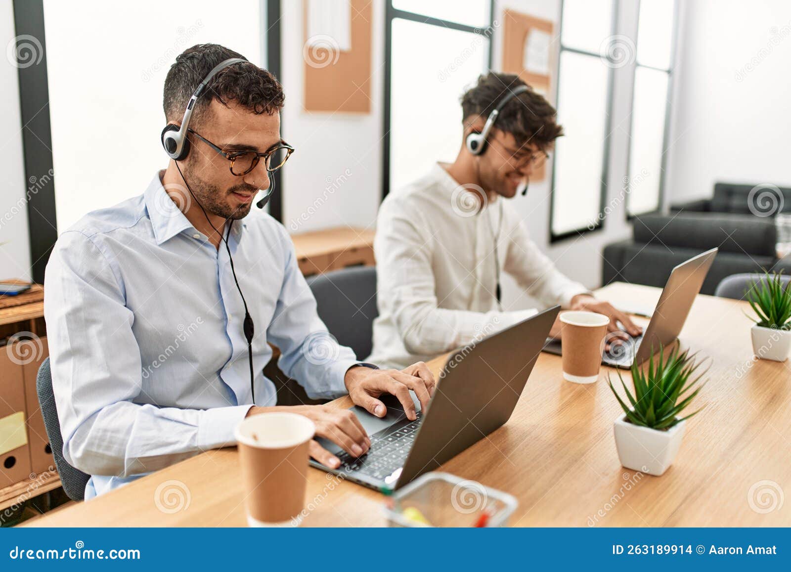 Two Hispanic Men Call Center Agents Smiling Confident Working at Office ...