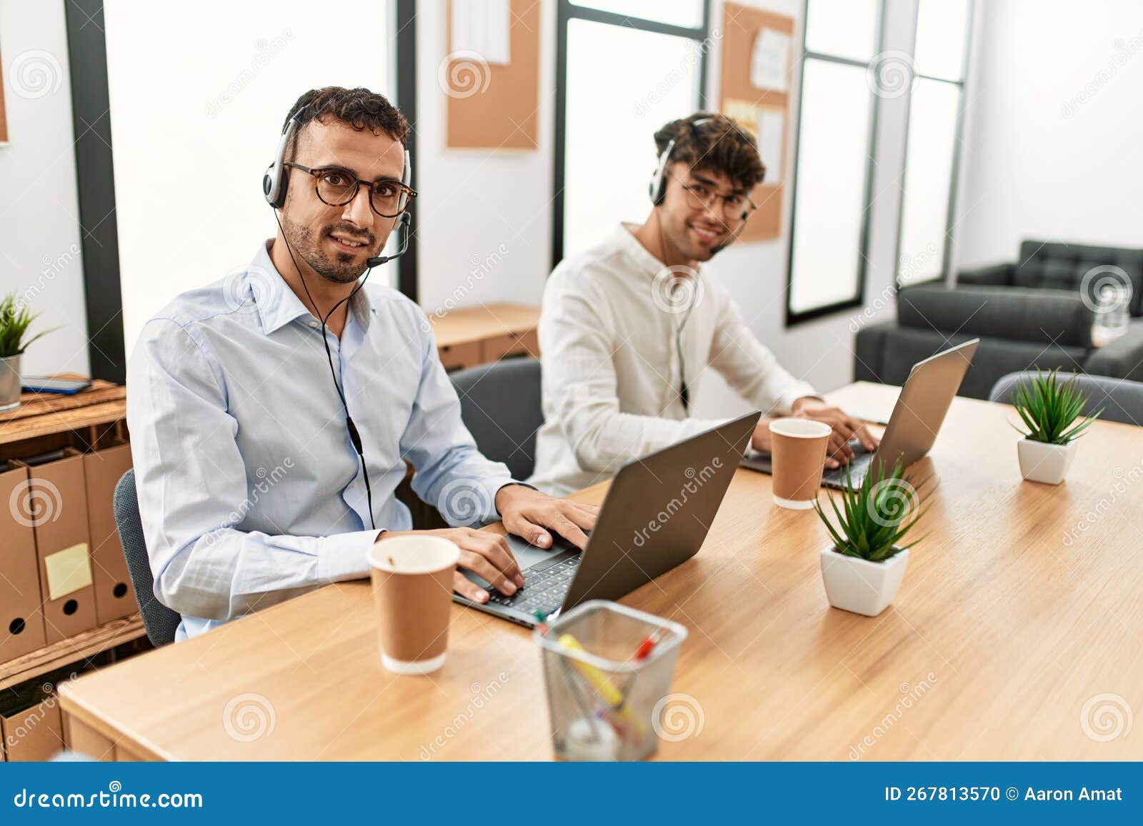 Two Hispanic Men Call Center Agents Smiling Confident Working at Office ...