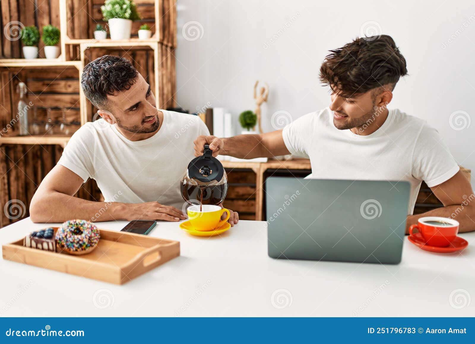 Two Hispanic Men Couple Pouring Coffee Having Breakfast at Home Stock ...