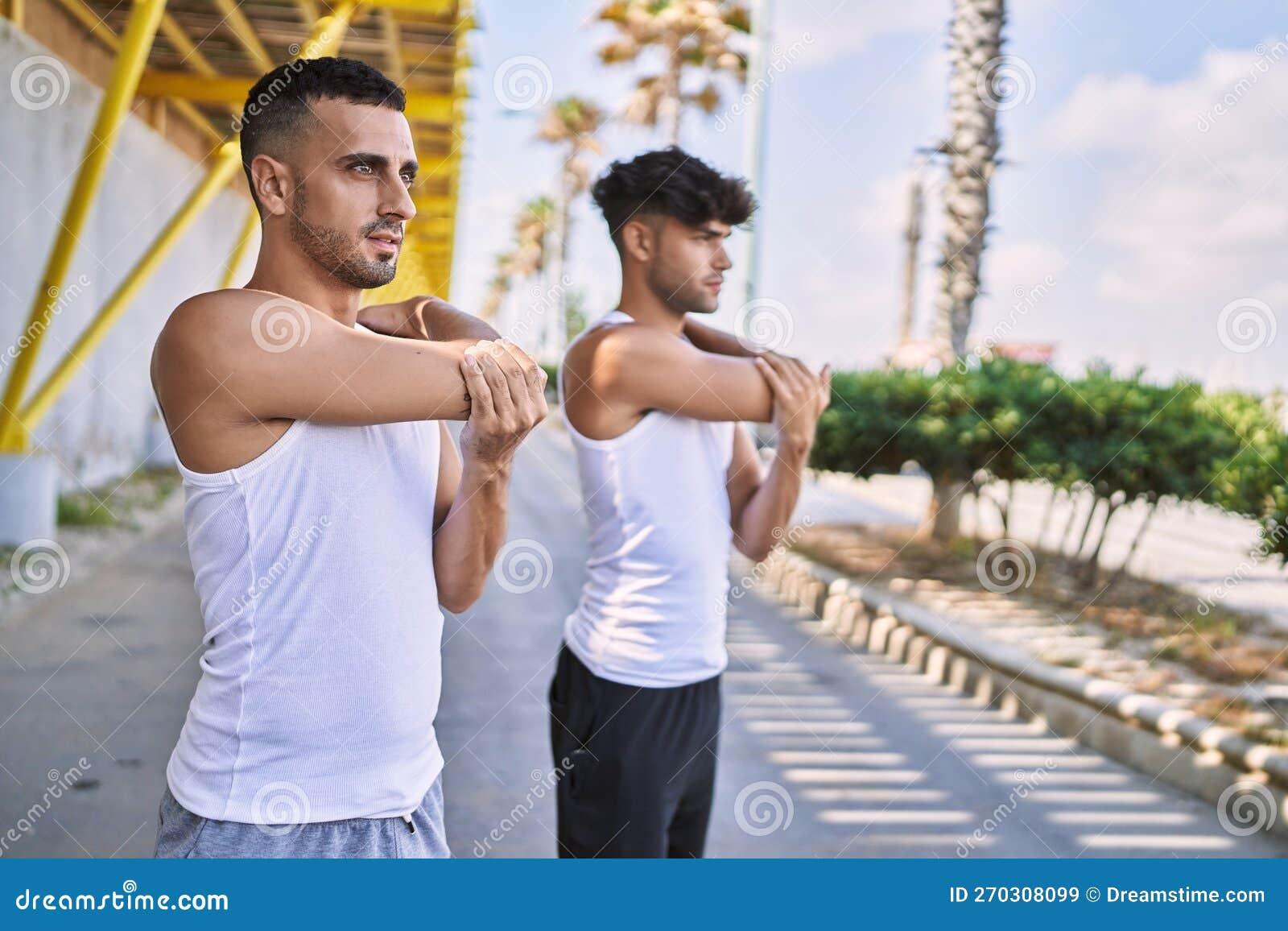 Two Hispanic Men Couple Stretching at Street Stock Image - Image of ...