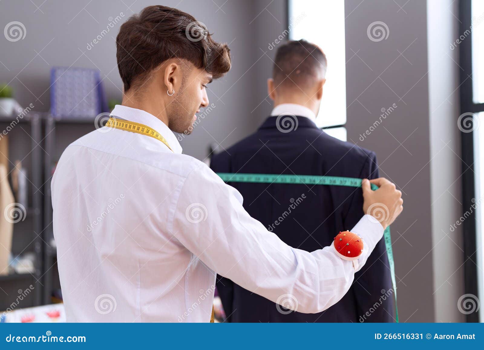 Two Hispanic Men Tailor Measuring Back Client at Atelier Stock Image ...