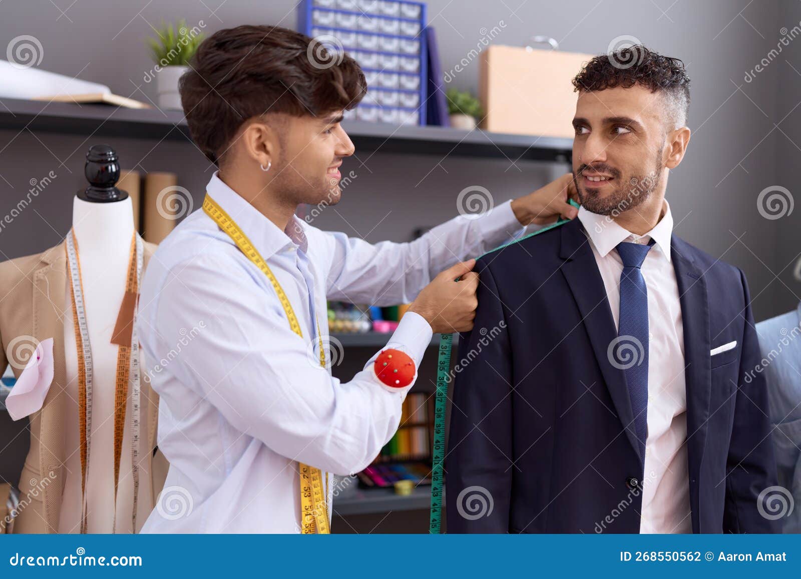 Two Hispanic Men Tailor Measuring Sleeve Jacket Client at Atelier Stock ...