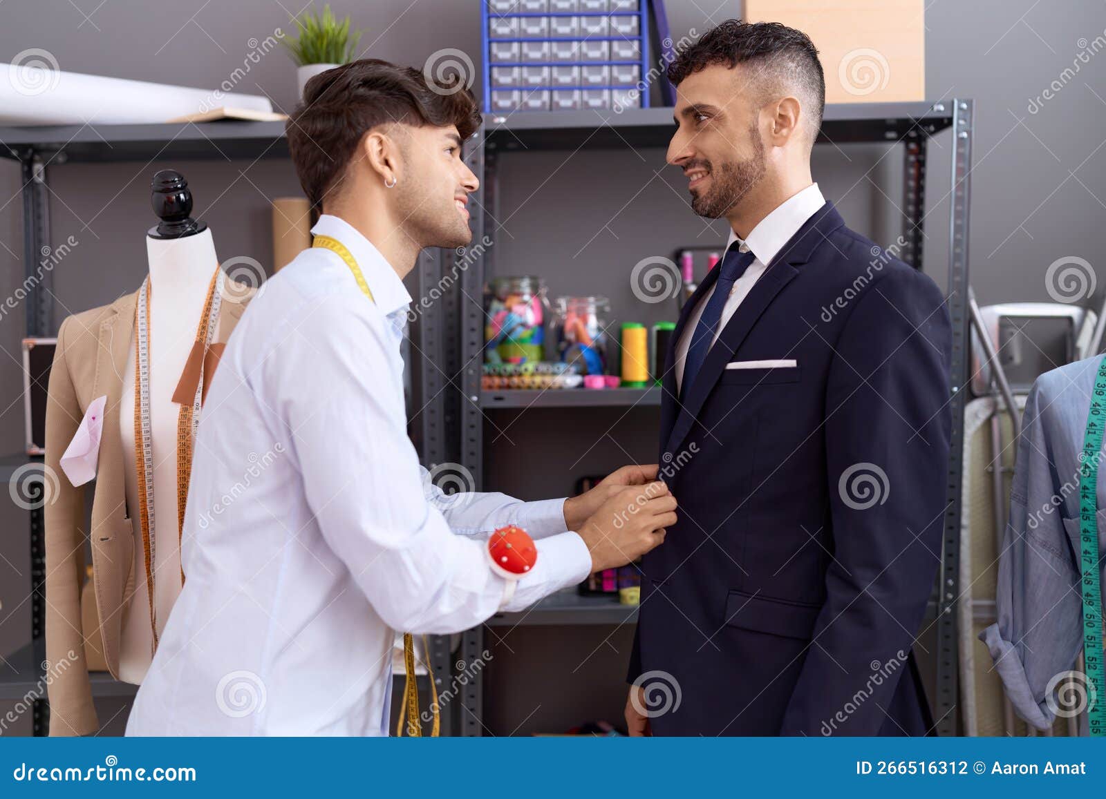 Two Hispanic Men Tailor Wearing Jacket To Client at Atelier Stock Photo ...