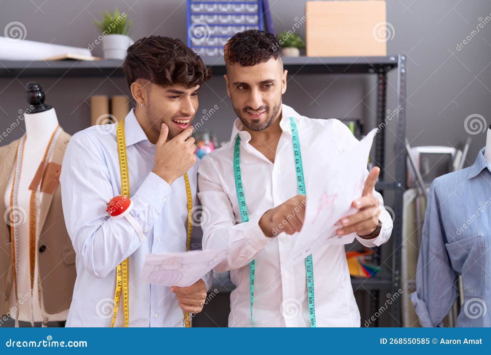 Two Hispanic Men Tailors Looking Clothing Design Speaking at Atelier ...