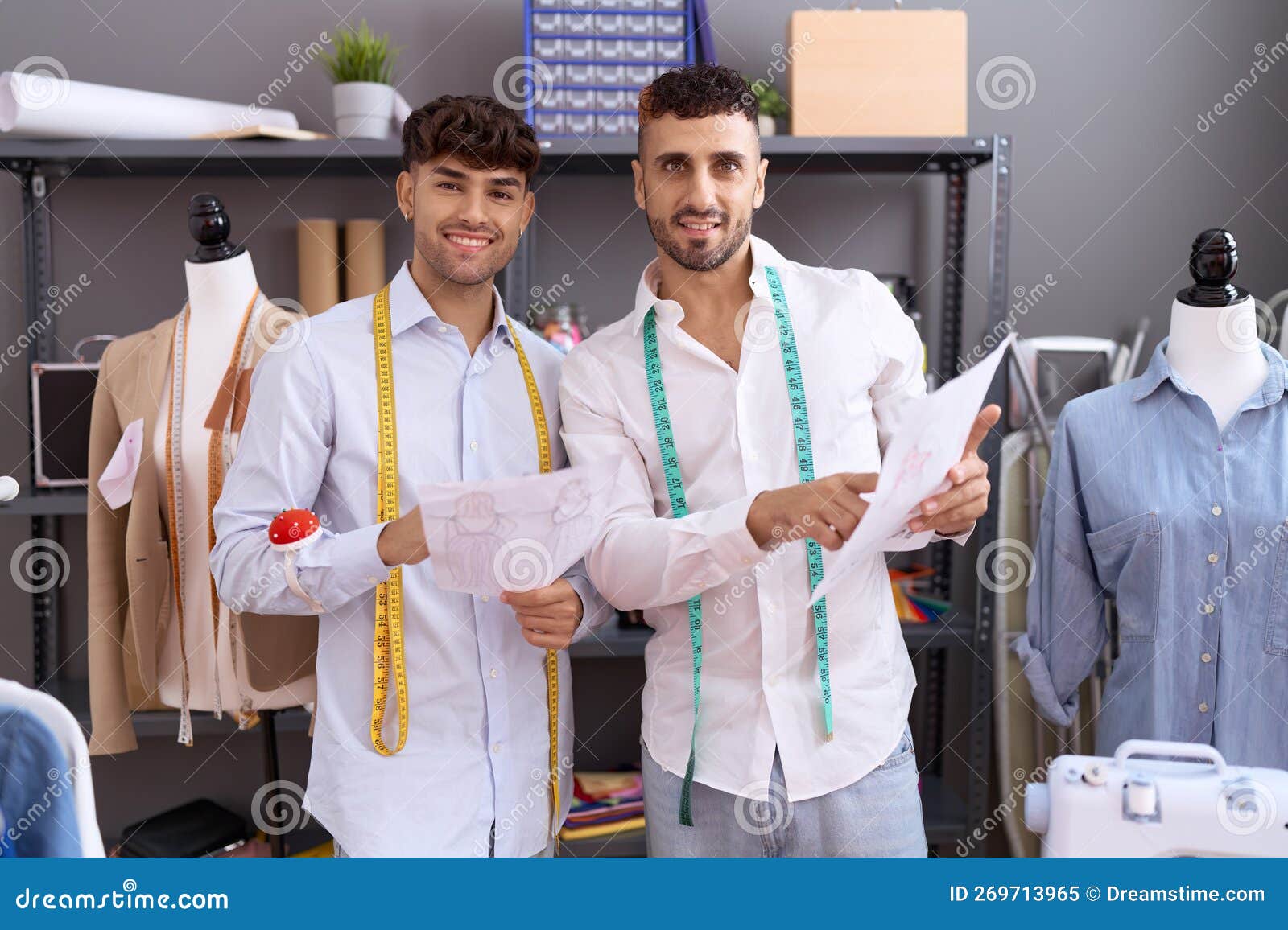 Two Hispanic Men Tailors Looking Clothing Design Speaking at Atelier ...