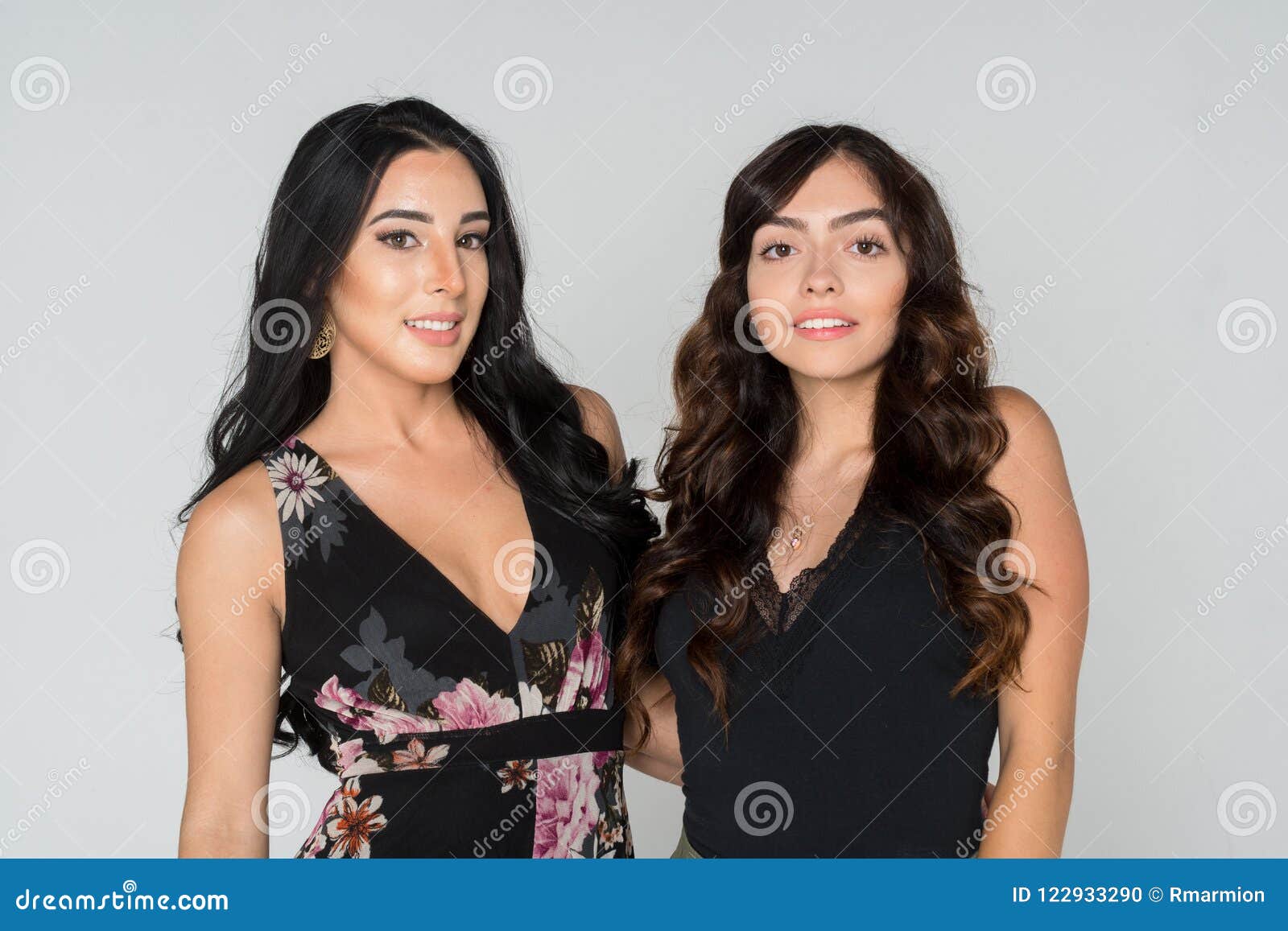 Two Hispanic Women Friends stock photo. Image of pretty - 122933290