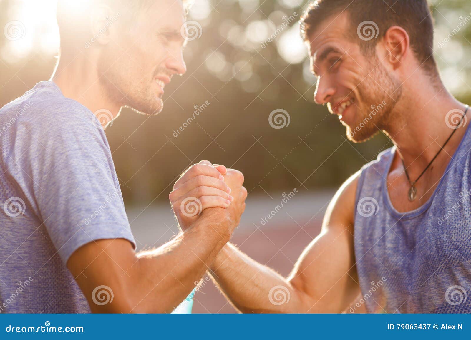 Two Hot Men Shake Each Others Hands on Summer Day Stock Image - Image ...