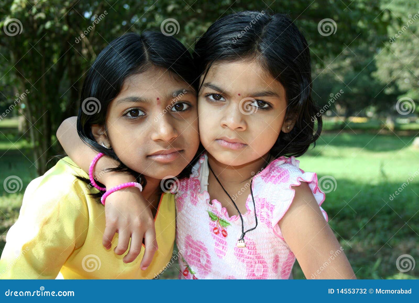 Two Hugging Sisters stock photo. Image of love, doting - 14553732
