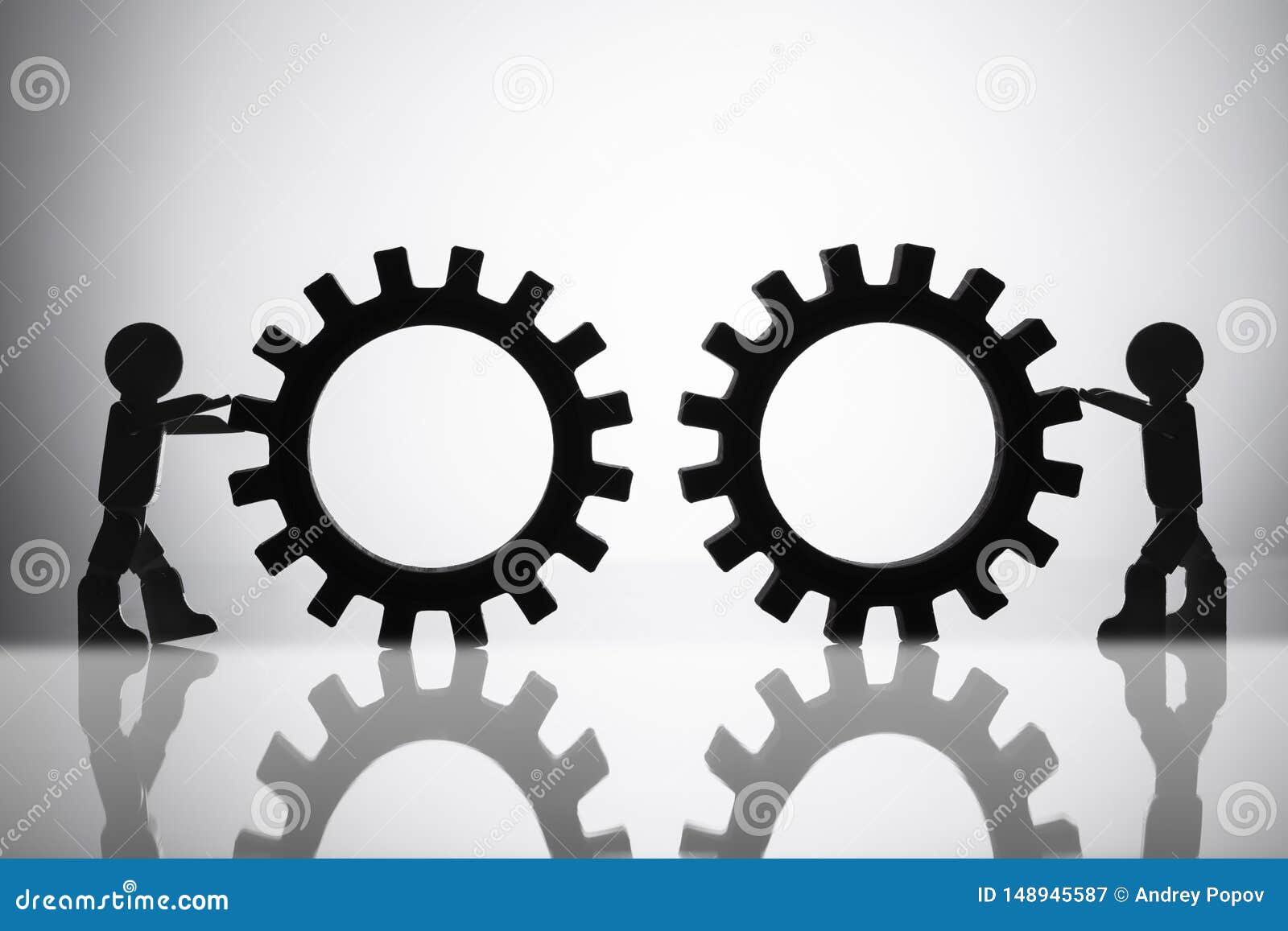 Two Human Figure Connecting Gears Stock Image - Image of engine, hold ...