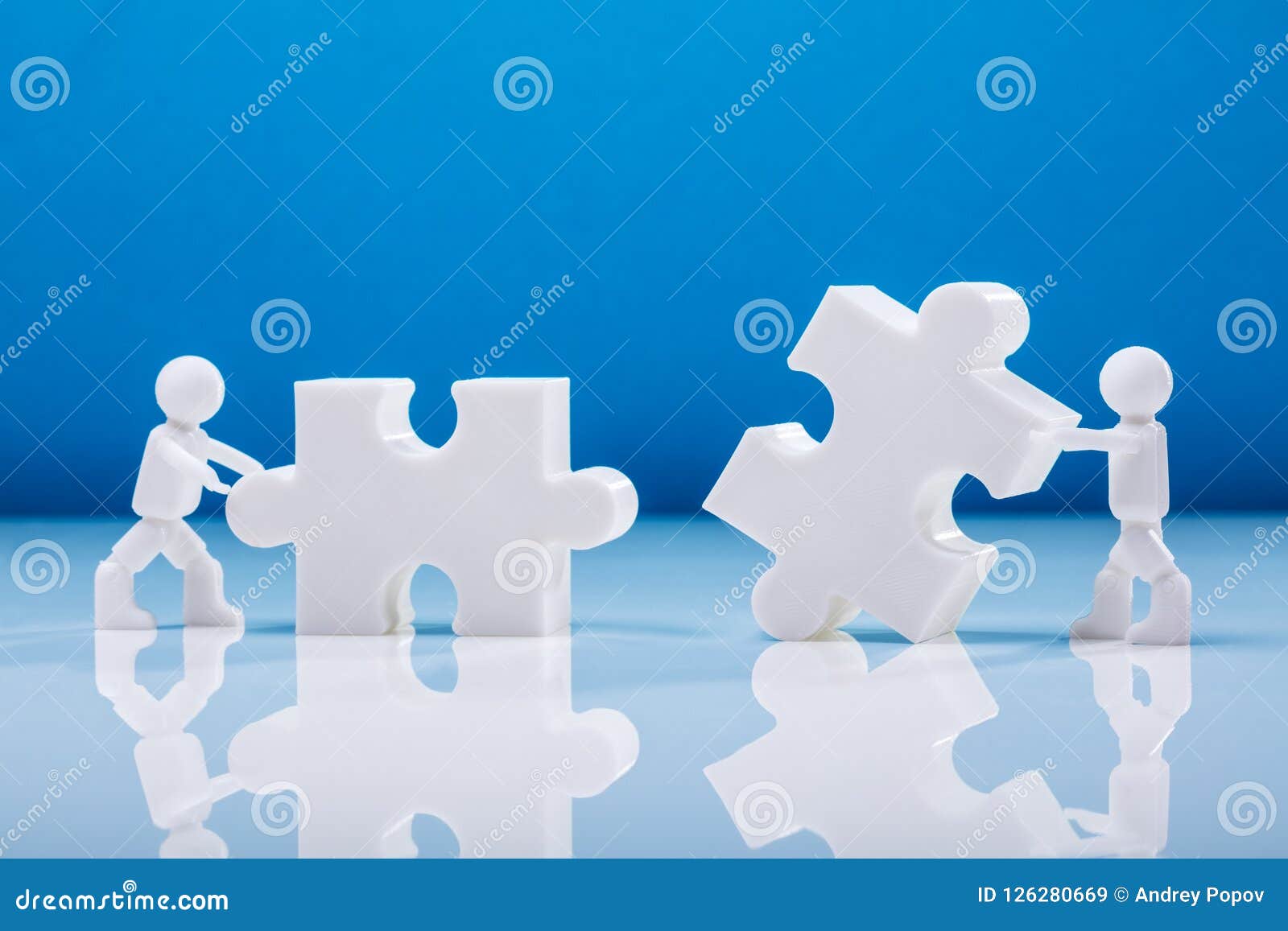 Two Human Figures Solving Jigsaw Puzzle Stock Image - Image of deal ...