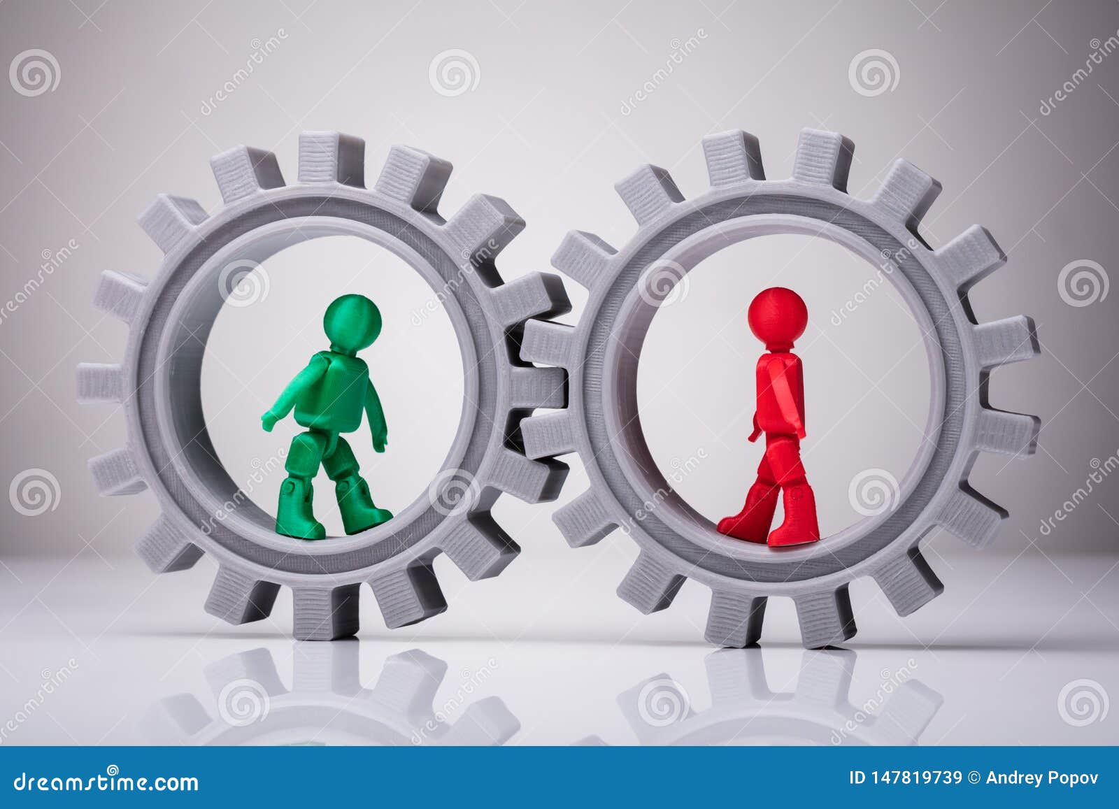 Two Human Figures Walking in Interlocked Gears Stock Image - Image of ...
