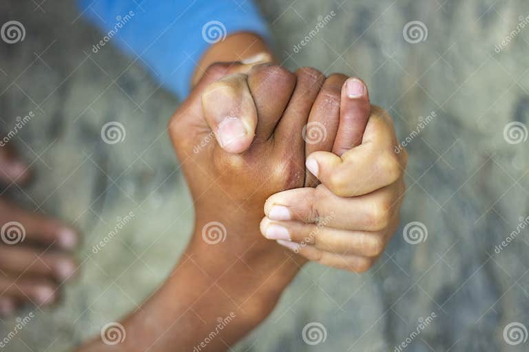 Two Human Hands are Joined Together and the Background is Blurred Stock ...