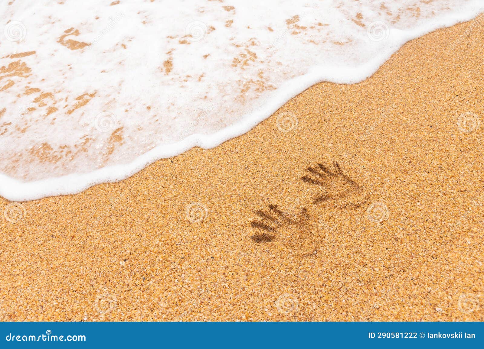Two Human Palm Prints in the Sand. Sandy Coast and Oncoming Wave Stock ...