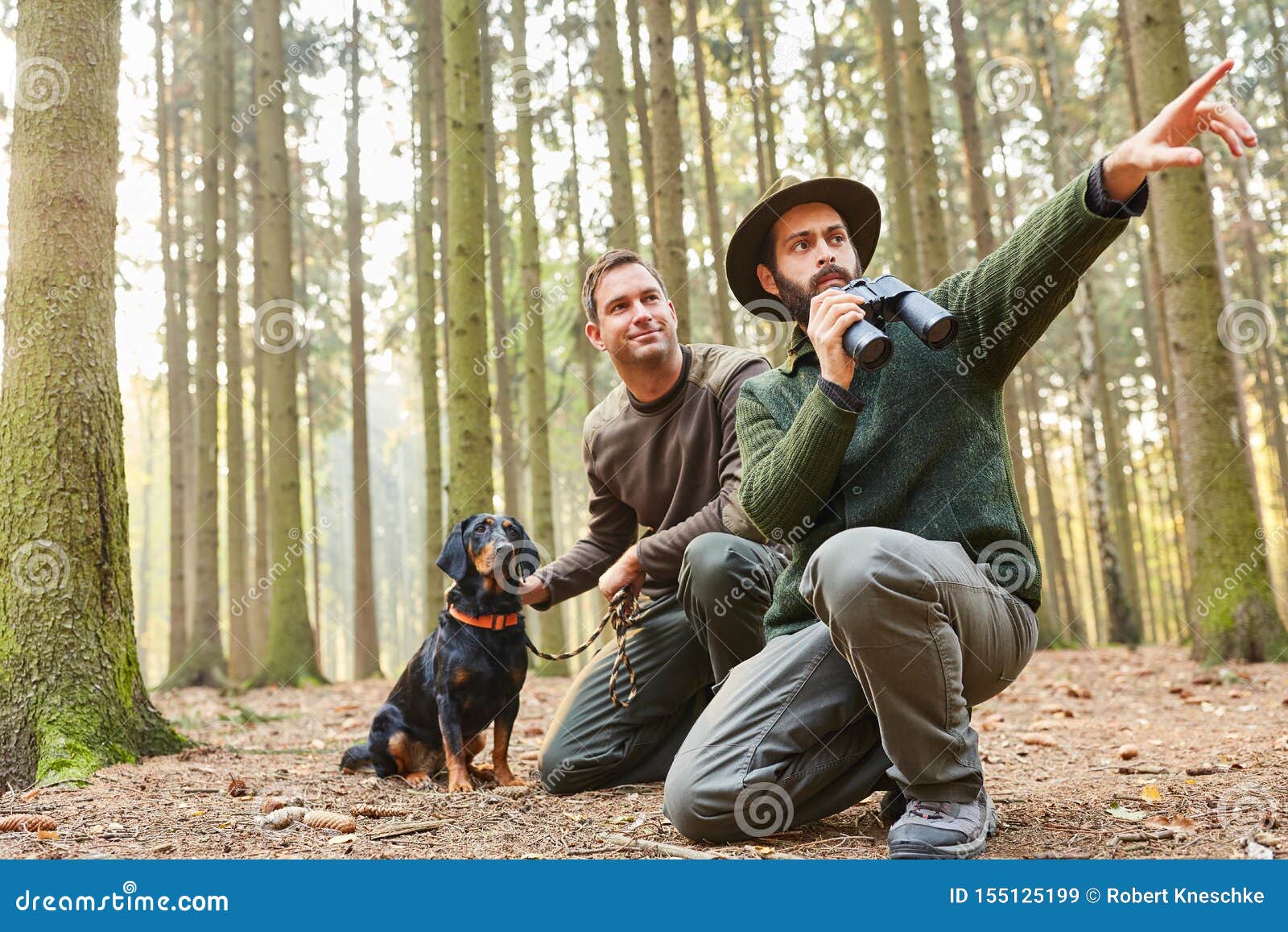 Two Hunters with Binoculars and with Hawk Stock Image - Image of ...