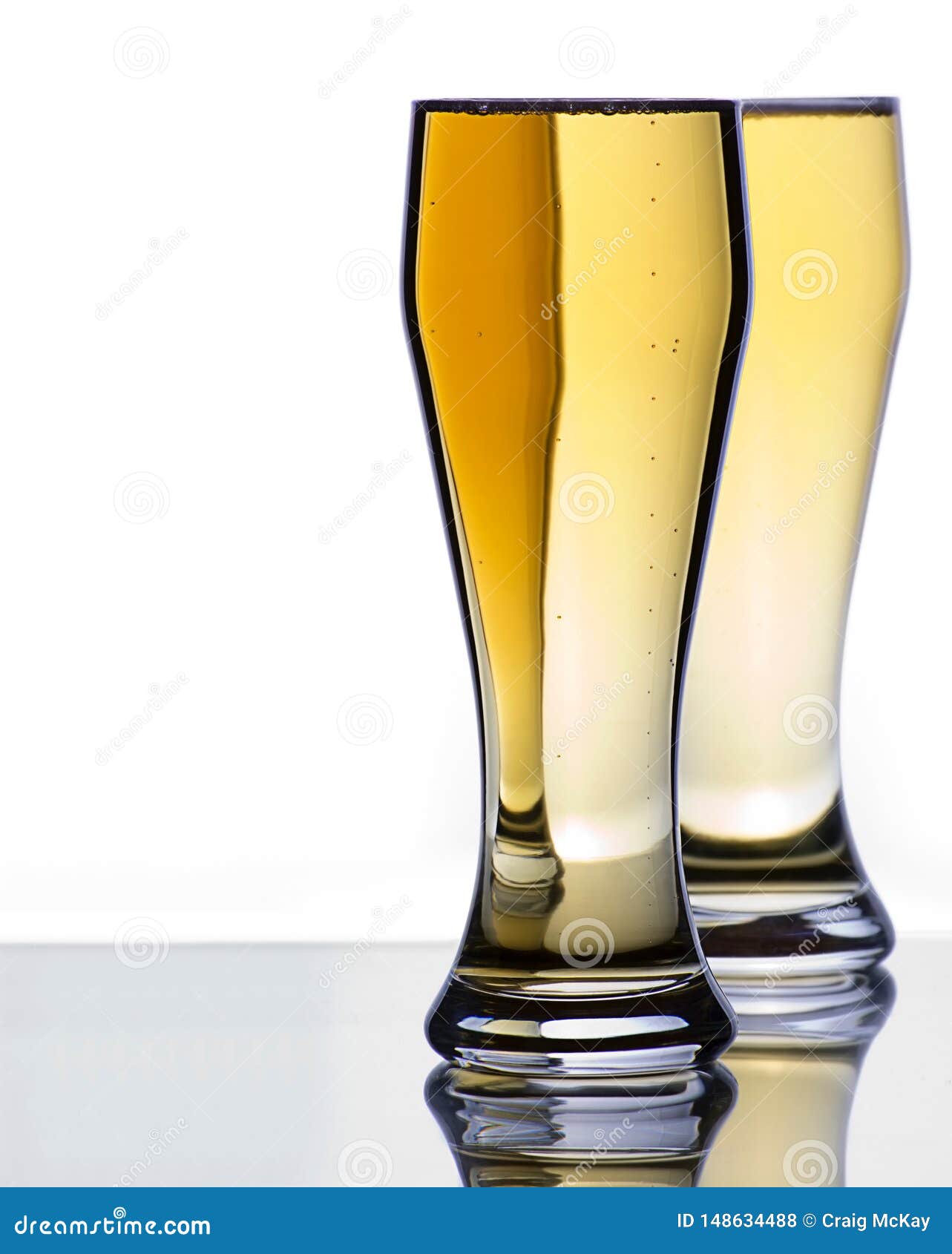 Two Ice Cold Beer Glasses on Reflective Surface Stock Photo - Image of ...