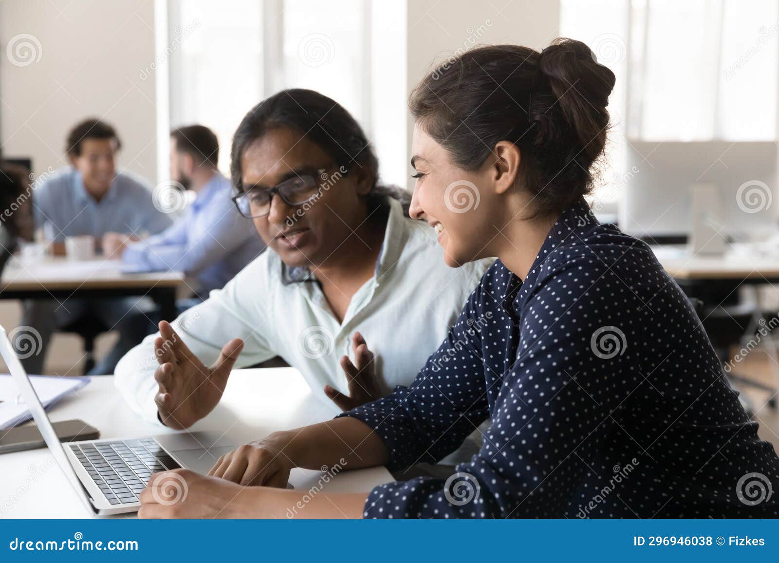 Two Indian Employees Watching Online Presentation on Laptop Computer ...