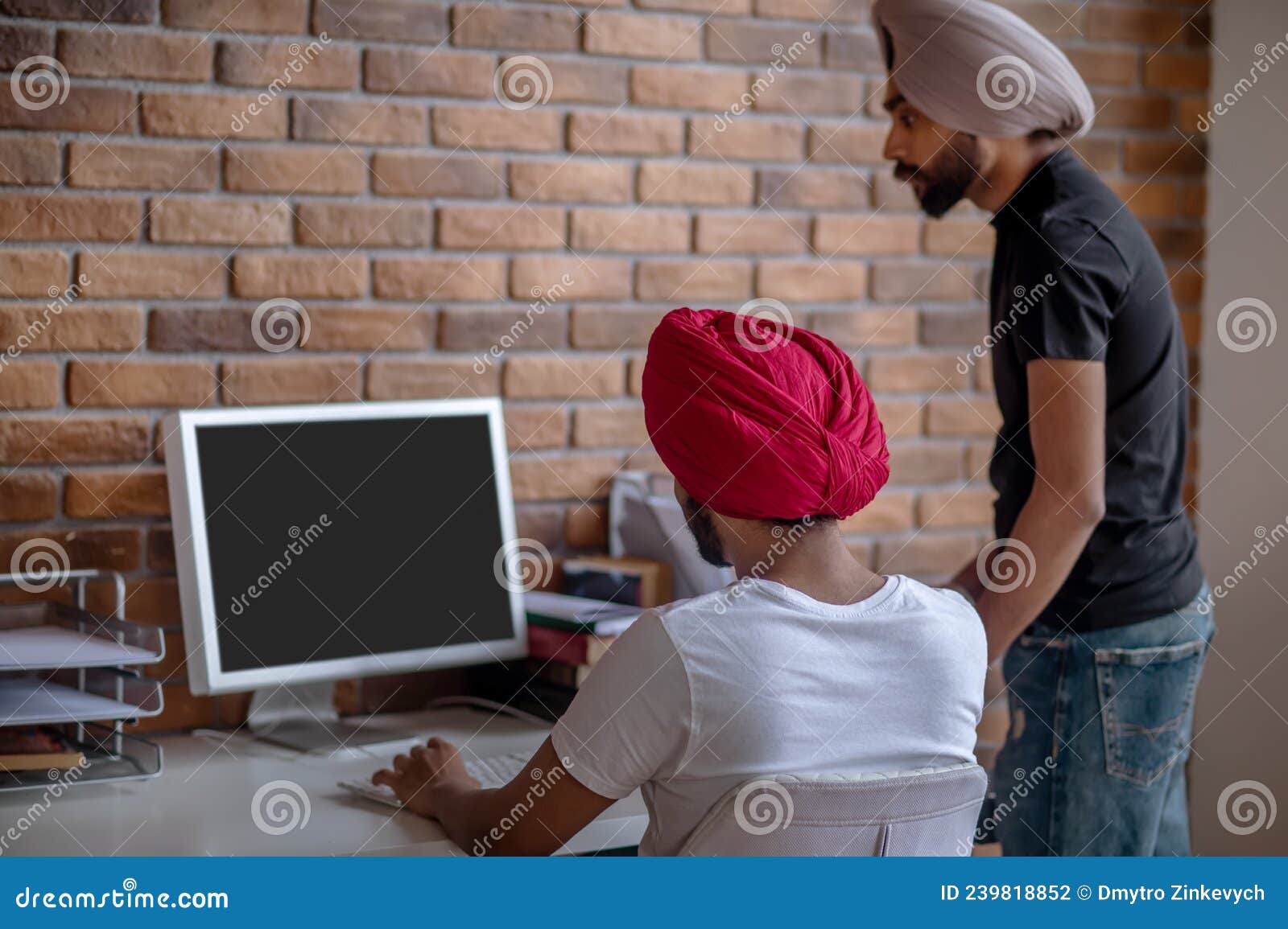 Two Indian Men Discussing Something and Looking Involved Stock Photo ...