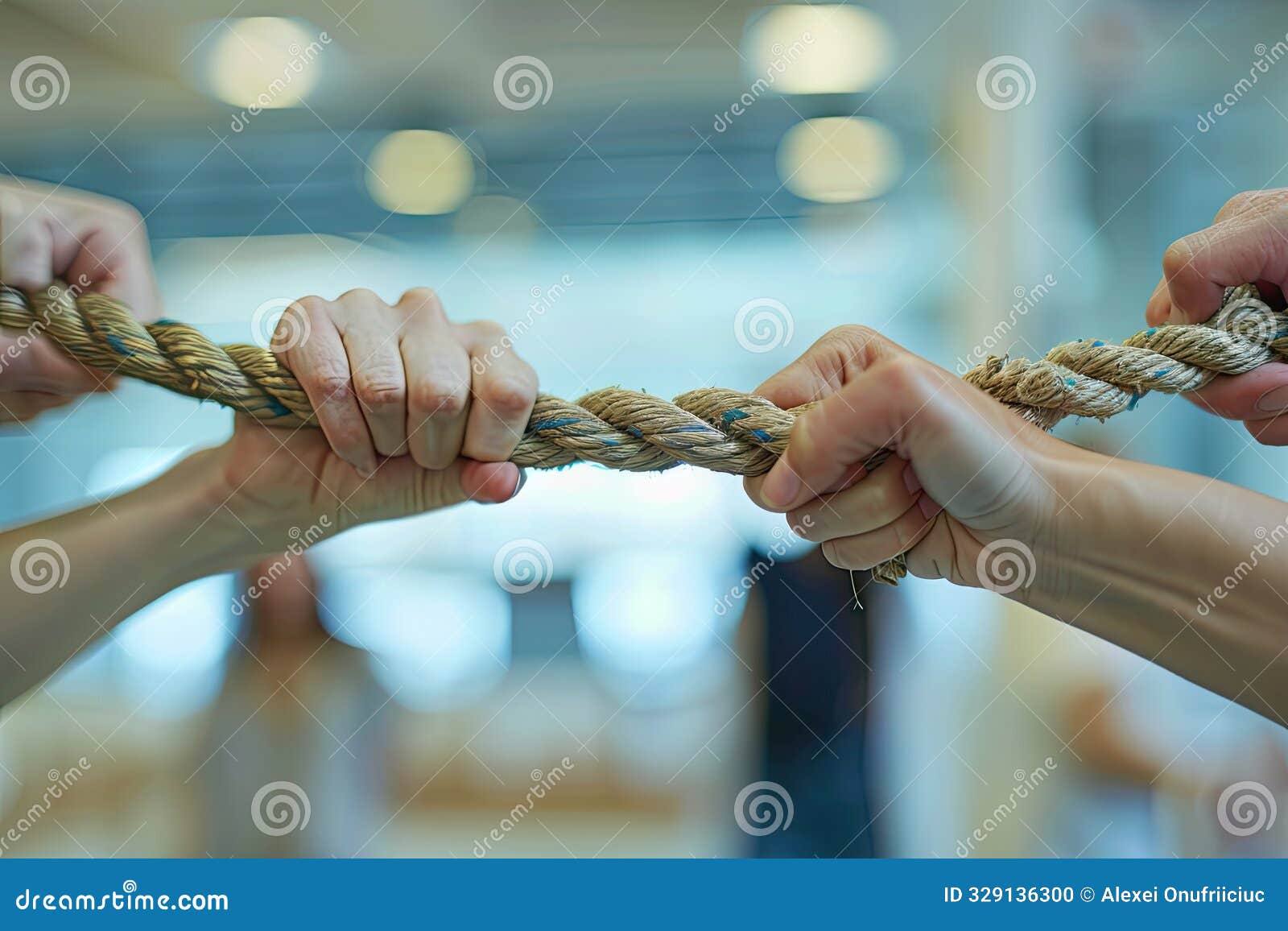 Two Individuals are Pulling a Long Rope in Completely Opposite ...