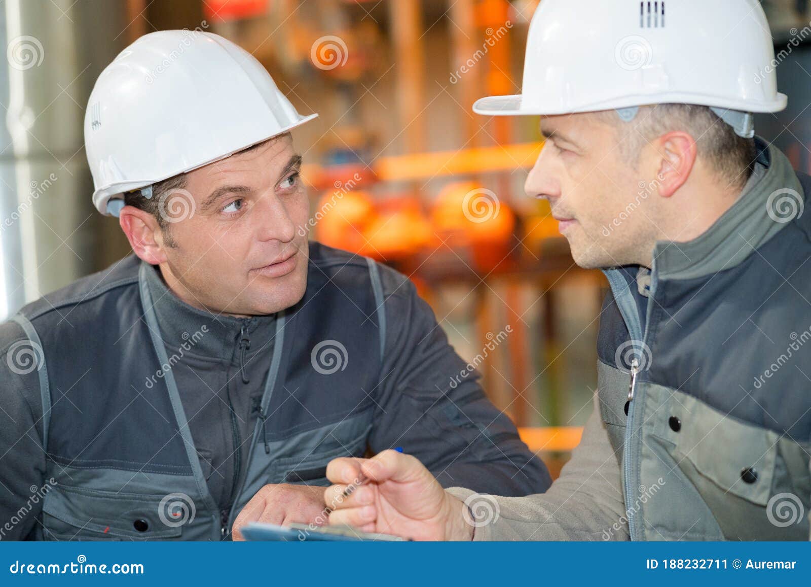Two Industrial Workers in Discussion Stock Image - Image of worker ...