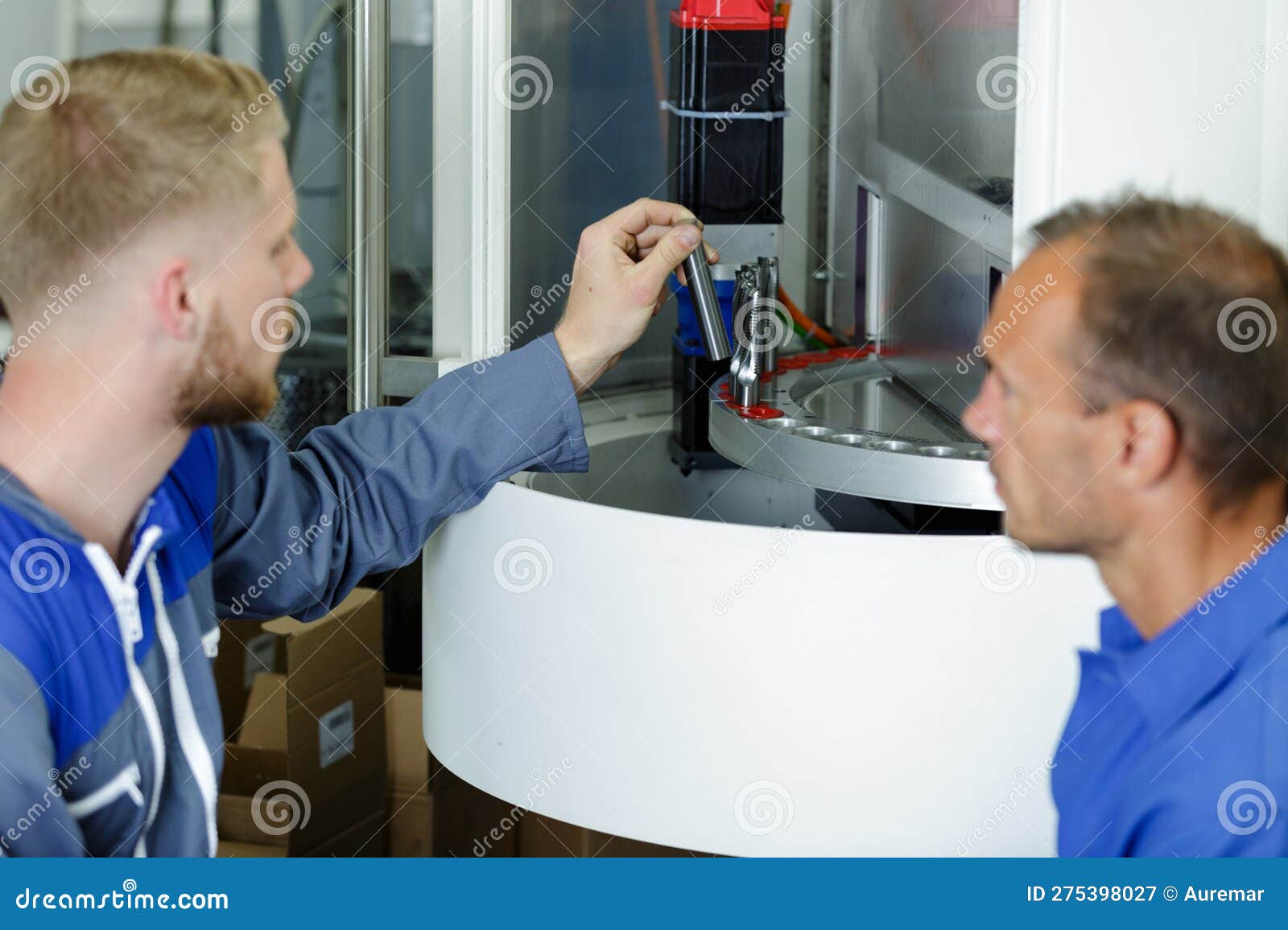 Two Industrial Workers Inspecting Work Piece Stock Image - Image of ... Two Industrial Workers Inspecting Work Piece Stock Image - Image of ...
