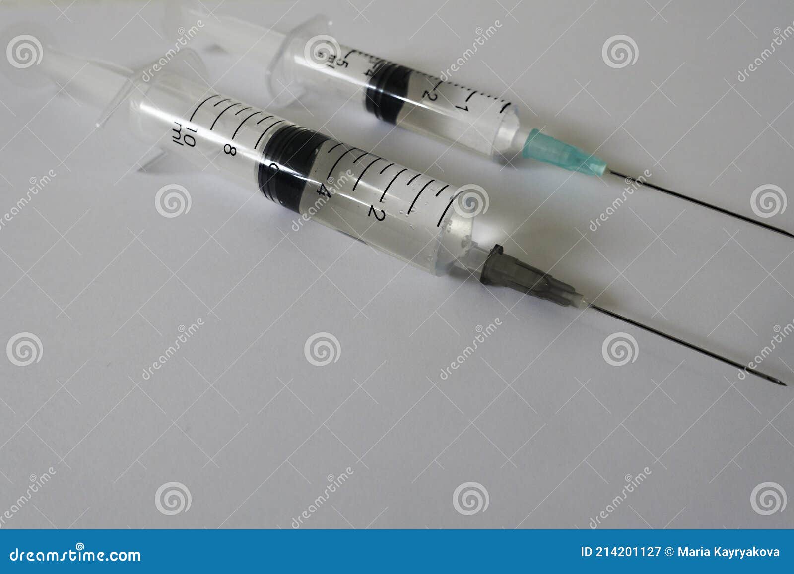 Two Injections on a White Surface Stock Image - Image of machine, light ...