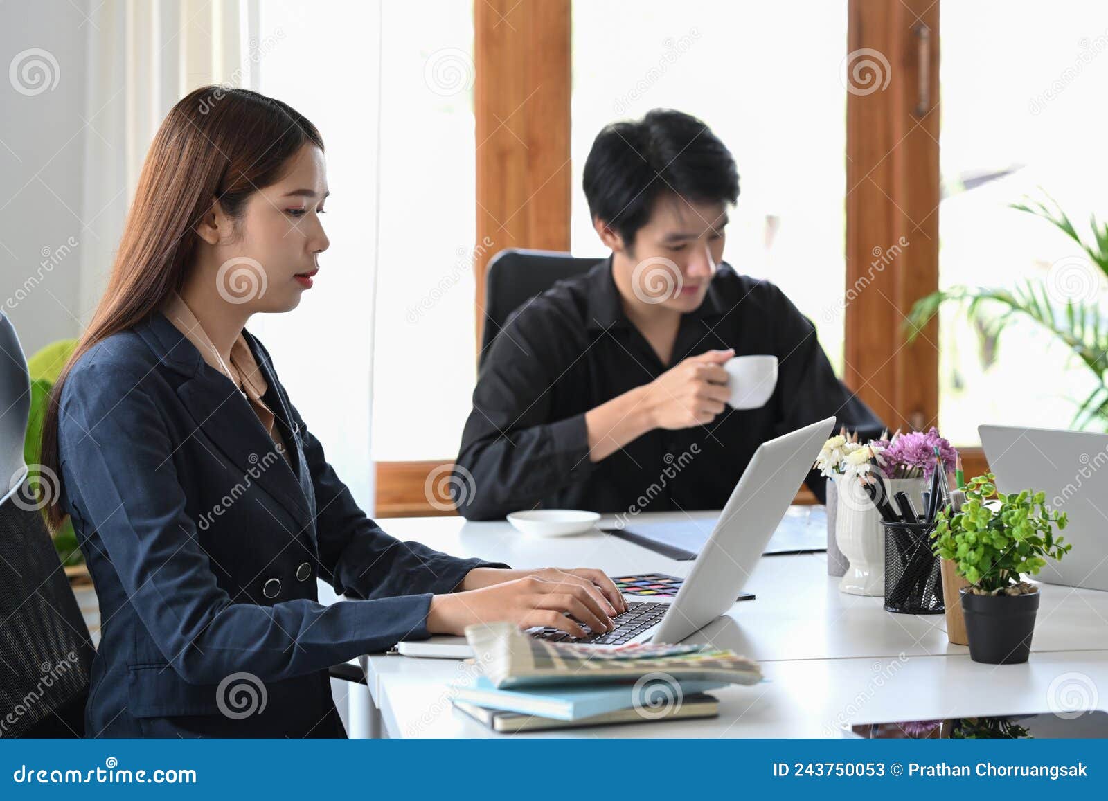 Two Interior Designers Working, Discussing New Project Plan Together ...