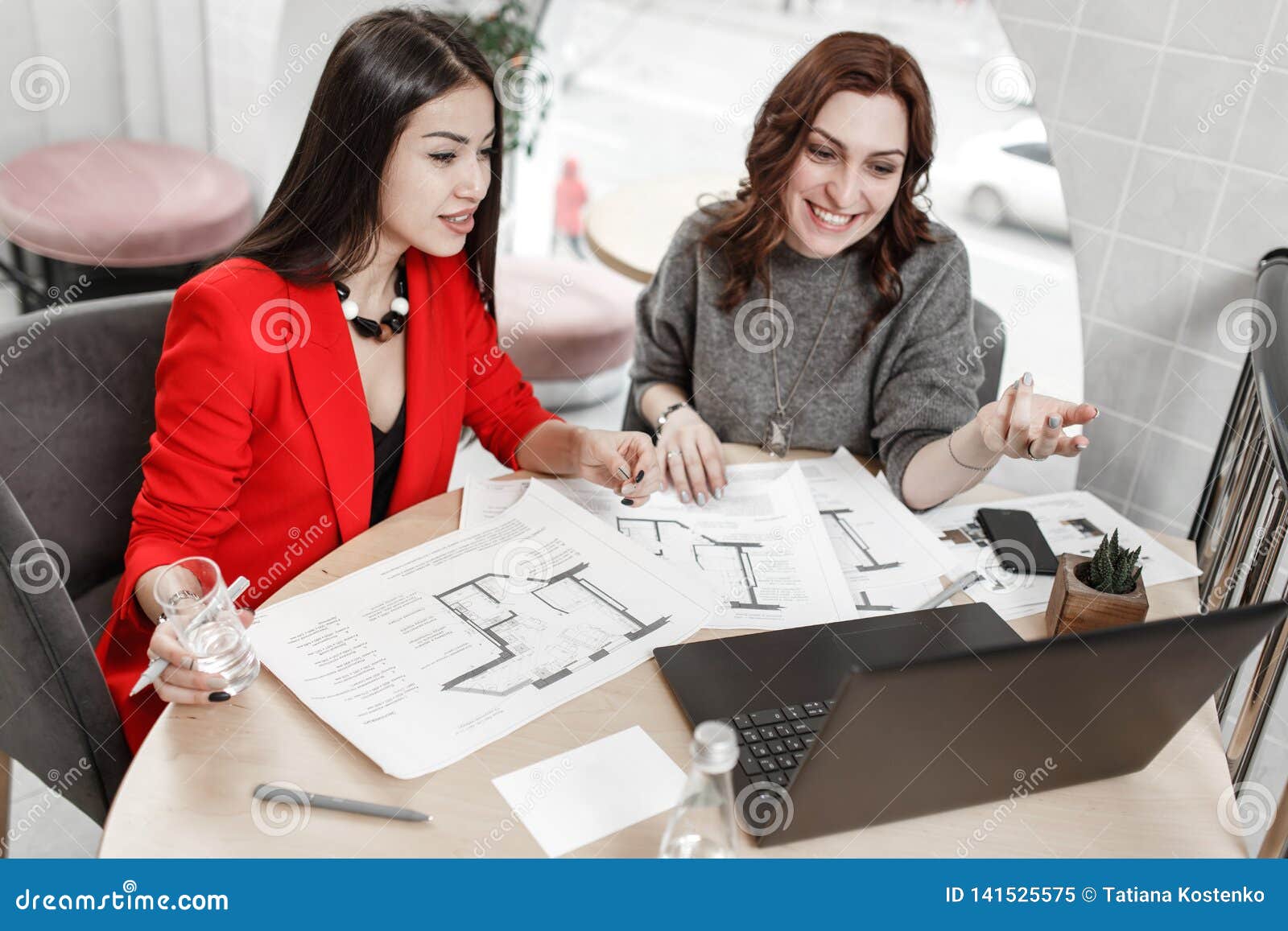 The Two Interior Designers are Working at the New Interior Design ...