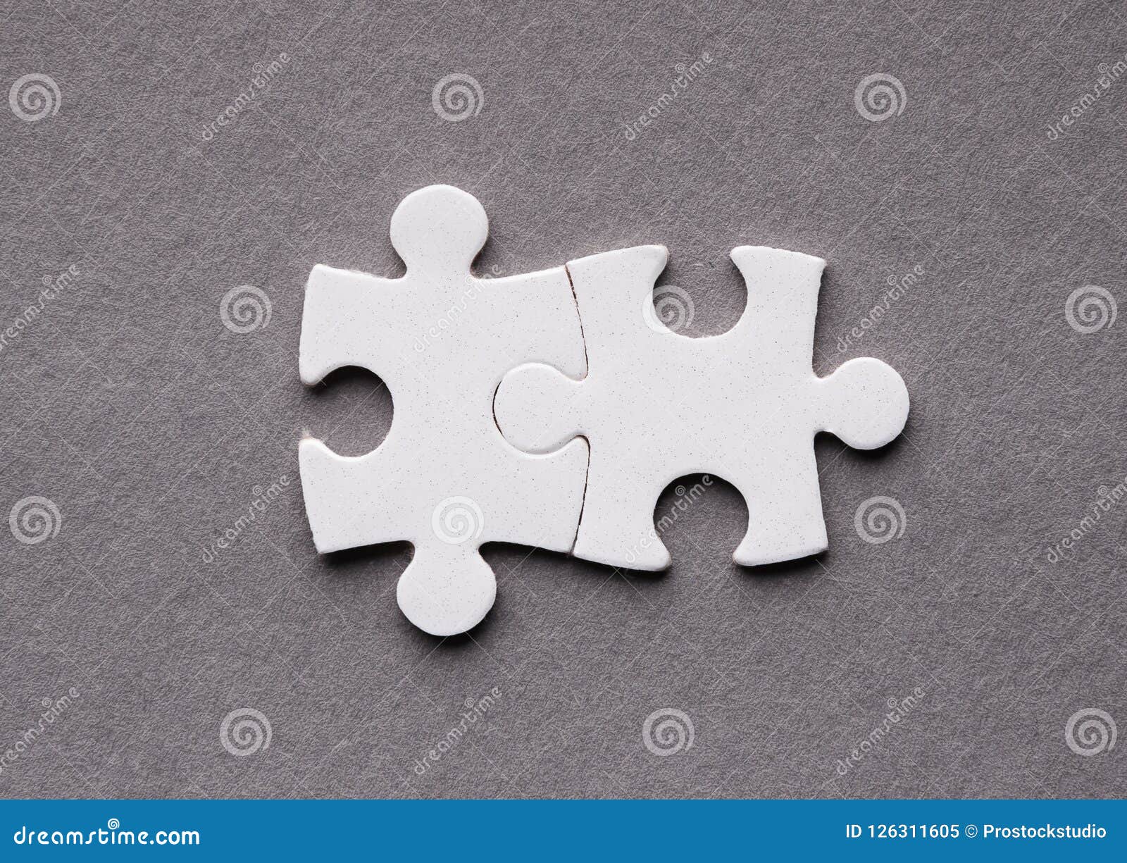 Two Interlocked Puzzle Pieces, Teamwork Concept Stock Image - Image of ...
